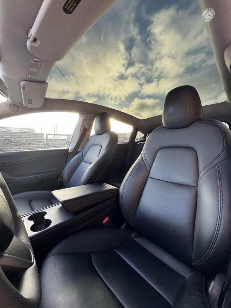 Grey Tesla Model Y 2021 in Vilnius, with an engine capacity of 0.00 L and mileage of 52 thousand km for 27700 €, photo 10 on AUTOMOTO.COM.LV