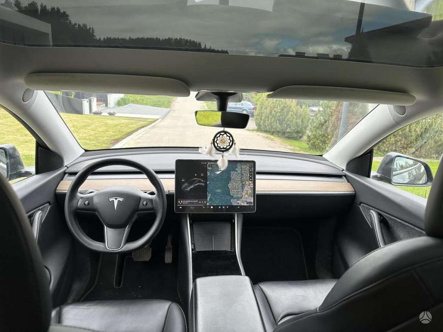 Grey Tesla Model Y 2021 in Vilnius, with an engine capacity of 0.00 L and mileage of 144 thousand km for 19500 €, photo 8 on AUTOMOTO.COM.LV