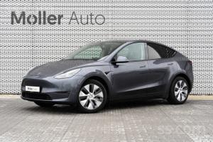 Grey Tesla Model Y 2022 in Riga, with an engine capacity of 0.00 L and mileage of 66 thousand km for 31490 €, photo 1 on AUTOMOTO.COM.LV