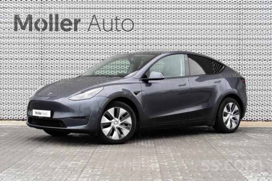 Grey Tesla Model Y 2022 in Riga, with an engine capacity of 0.00 L and mileage of 66 thousand km for 31490 €, photo 1 on AUTOMOTO.COM.LV