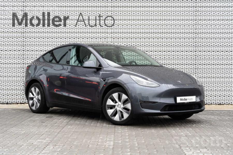 Grey Tesla Model Y 2022 in Riga, with an engine capacity of 0.00 L and mileage of 66 thousand km for 31490 €, photo 2 on AUTOMOTO.COM.LV