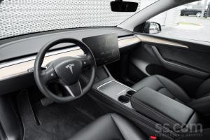 Grey Tesla Model Y 2022 in Riga, with an engine capacity of 0.00 L and mileage of 66 thousand km for 31490 €, photo 9 on AUTOMOTO.COM.LV