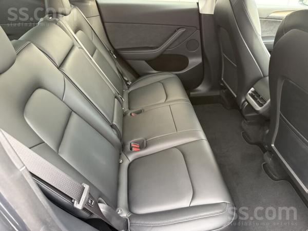 Grey Tesla Model Y 2022 in Riga, with an engine capacity of 0.00 L and mileage of 104 thousand km for 30500 €, photo 11 on AUTOMOTO.COM.LV