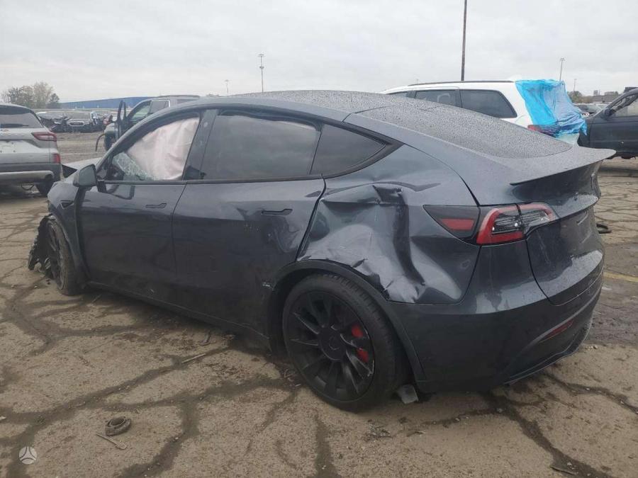 Pelēks Tesla Model Y 2022 Kauņa, ar dzinēja tilpumu 0.00 L un nobraukumu 67 tūkst. km par 13500 €, foto 2 vietnē AUTOMOTO.COM.LV