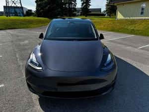Grey Tesla Model Y 2022 in Vilnius, with an engine capacity of 0.00 L and mileage of 60 thousand km for 30950 €, photo 7 on AUTOMOTO.COM.LV