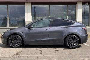 Grey Tesla Model Y 2022 in Vilnius, with an engine capacity of 0.00 L and mileage of 159 thousand km for 24999 €, photo 3 on AUTOMOTO.COM.LV