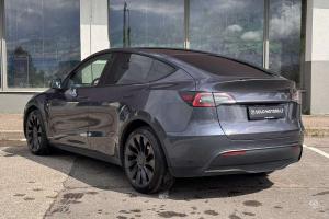 Grey Tesla Model Y 2022 in Vilnius, with an engine capacity of 0.00 L and mileage of 159 thousand km for 24999 €, photo 4 on AUTOMOTO.COM.LV
