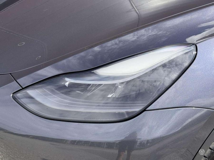 Grey Tesla Model Y 2022 in Vilnius, with an engine capacity of 0.00 L and mileage of 159 thousand km for 24999 €, photo 10 on AUTOMOTO.COM.LV