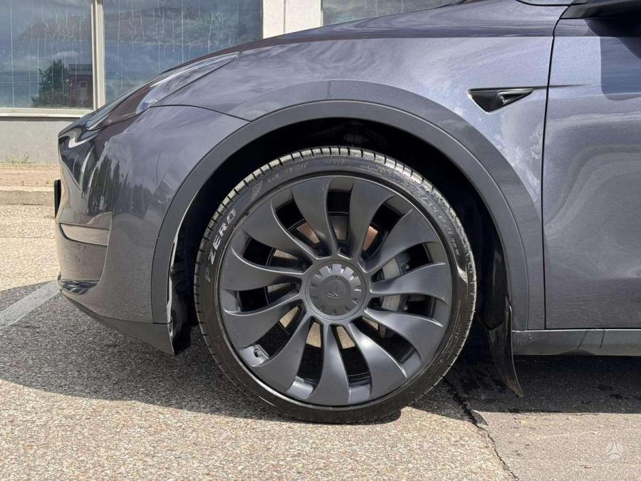 Grey Tesla Model Y 2022 in Vilnius, with an engine capacity of 0.00 L and mileage of 159 thousand km for 24999 €, photo 12 on AUTOMOTO.COM.LV