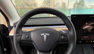 Grey Tesla Model Y 2022 in Vilnius, with an engine capacity of 0.00 L and mileage of 159 thousand km for 24999 €, photo 19 on AUTOMOTO.COM.LV