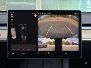 Grey Tesla Model Y 2022 in Vilnius, with an engine capacity of 0.00 L and mileage of 159 thousand km for 24999 €, photo 26 on AUTOMOTO.COM.LV