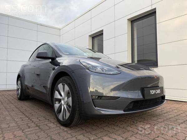 Grey Tesla Model Y 2022 in Riga, with an engine capacity of 0.00 L and mileage of 98 thousand km for 33500 €, photo 1 on AUTOMOTO.COM.LV
