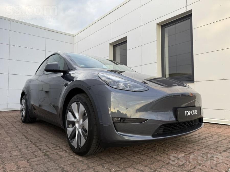 Grey Tesla Model Y 2022 in Riga, with an engine capacity of 0.00 L and mileage of 98 thousand km for 33500 €, photo 1 on AUTOMOTO.COM.LV