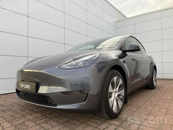 Grey Tesla Model Y 2022 in Riga, with an engine capacity of 0.00 L and mileage of 98 thousand km for 33500 €, photo 2 on AUTOMOTO.COM.LV