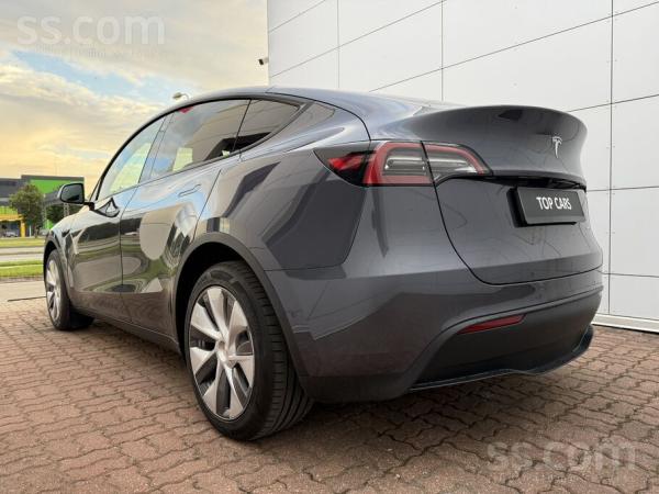 Grey Tesla Model Y 2022 in Riga, with an engine capacity of 0.00 L and mileage of 98 thousand km for 33500 €, photo 3 on AUTOMOTO.COM.LV