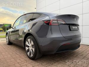 Grey Tesla Model Y 2022 in Riga, with an engine capacity of 0.00 L and mileage of 98 thousand km for 33500 €, photo 4 on AUTOMOTO.COM.LV