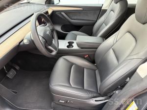 Grey Tesla Model Y 2022 in Riga, with an engine capacity of 0.00 L and mileage of 98 thousand km for 33500 €, photo 6 on AUTOMOTO.COM.LV