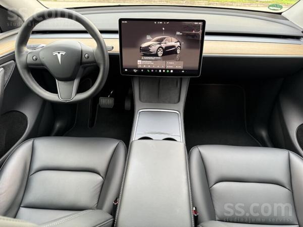 Grey Tesla Model Y 2022 in Riga, with an engine capacity of 0.00 L and mileage of 98 thousand km for 33500 €, photo 7 on AUTOMOTO.COM.LV