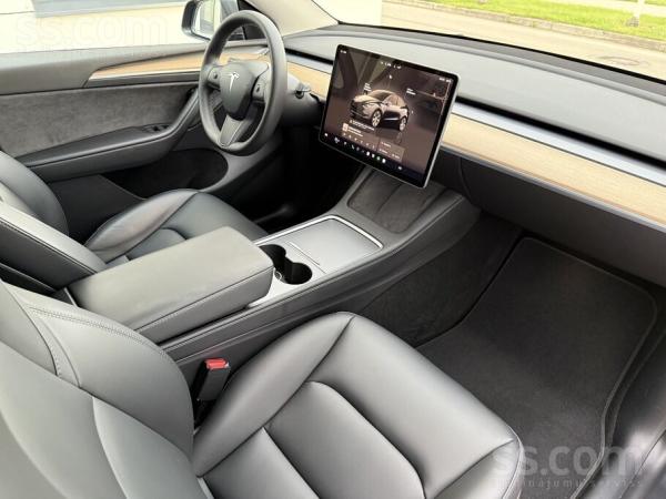 Grey Tesla Model Y 2022 in Riga, with an engine capacity of 0.00 L and mileage of 98 thousand km for 33500 €, photo 9 on AUTOMOTO.COM.LV