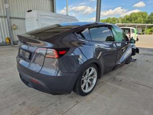Pelēks Tesla Model Y 2022 Kauņa, ar dzinēja tilpumu 0.00 L un nobraukumu 89 tūkst. km par 18500 €, foto 7 vietnē AUTOMOTO.COM.LV