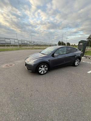 Grey Tesla Model Y 2022 in Marijampole, with an engine capacity of 0.00 L and mileage of 135 thousand km for 27900 €, photo 3 on AUTOMOTO.COM.LV