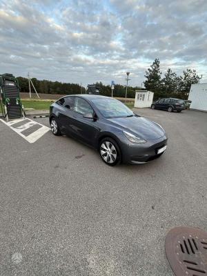 Grey Tesla Model Y 2022 in Marijampole, with an engine capacity of 0.00 L and mileage of 135 thousand km for 27900 €, photo 7 on AUTOMOTO.COM.LV