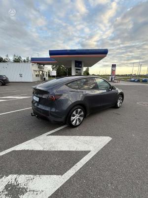 Grey Tesla Model Y 2022 in Marijampole, with an engine capacity of 0.00 L and mileage of 135 thousand km for 27900 €, photo 8 on AUTOMOTO.COM.LV