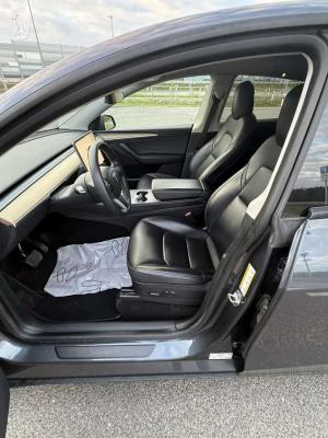 Grey Tesla Model Y 2022 in Marijampole, with an engine capacity of 0.00 L and mileage of 135 thousand km for 27900 €, photo 10 on AUTOMOTO.COM.LV