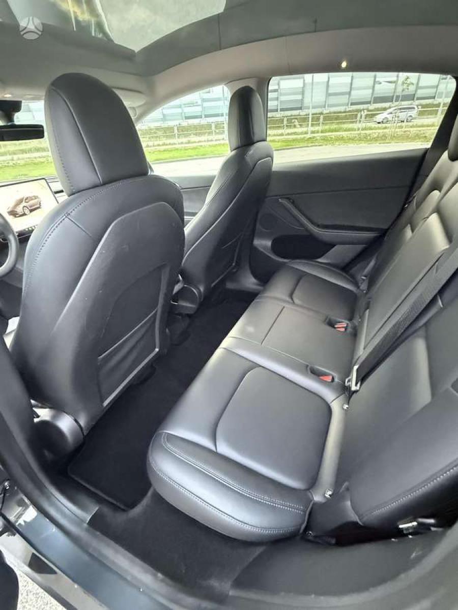 Grey Tesla Model Y 2022 in Marijampole, with an engine capacity of 0.00 L and mileage of 135 thousand km for 27900 €, photo 12 on AUTOMOTO.COM.LV