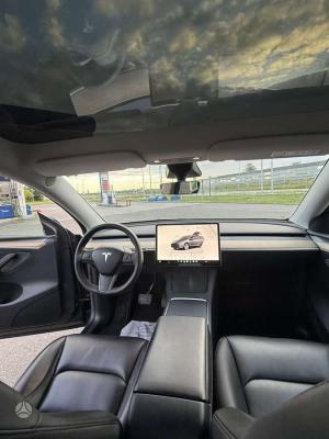 Grey Tesla Model Y 2022 in Marijampole, with an engine capacity of 0.00 L and mileage of 135 thousand km for 27900 €, photo 16 on AUTOMOTO.COM.LV