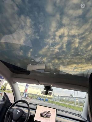 Grey Tesla Model Y 2022 in Marijampole, with an engine capacity of 0.00 L and mileage of 135 thousand km for 27900 €, photo 17 on AUTOMOTO.COM.LV