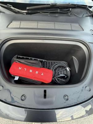 Grey Tesla Model Y 2022 in Marijampole, with an engine capacity of 0.00 L and mileage of 135 thousand km for 27900 €, photo 18 on AUTOMOTO.COM.LV