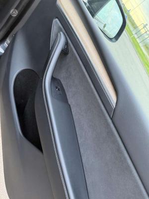 Grey Tesla Model Y 2022 in Marijampole, with an engine capacity of 0.00 L and mileage of 135 thousand km for 27900 €, photo 20 on AUTOMOTO.COM.LV