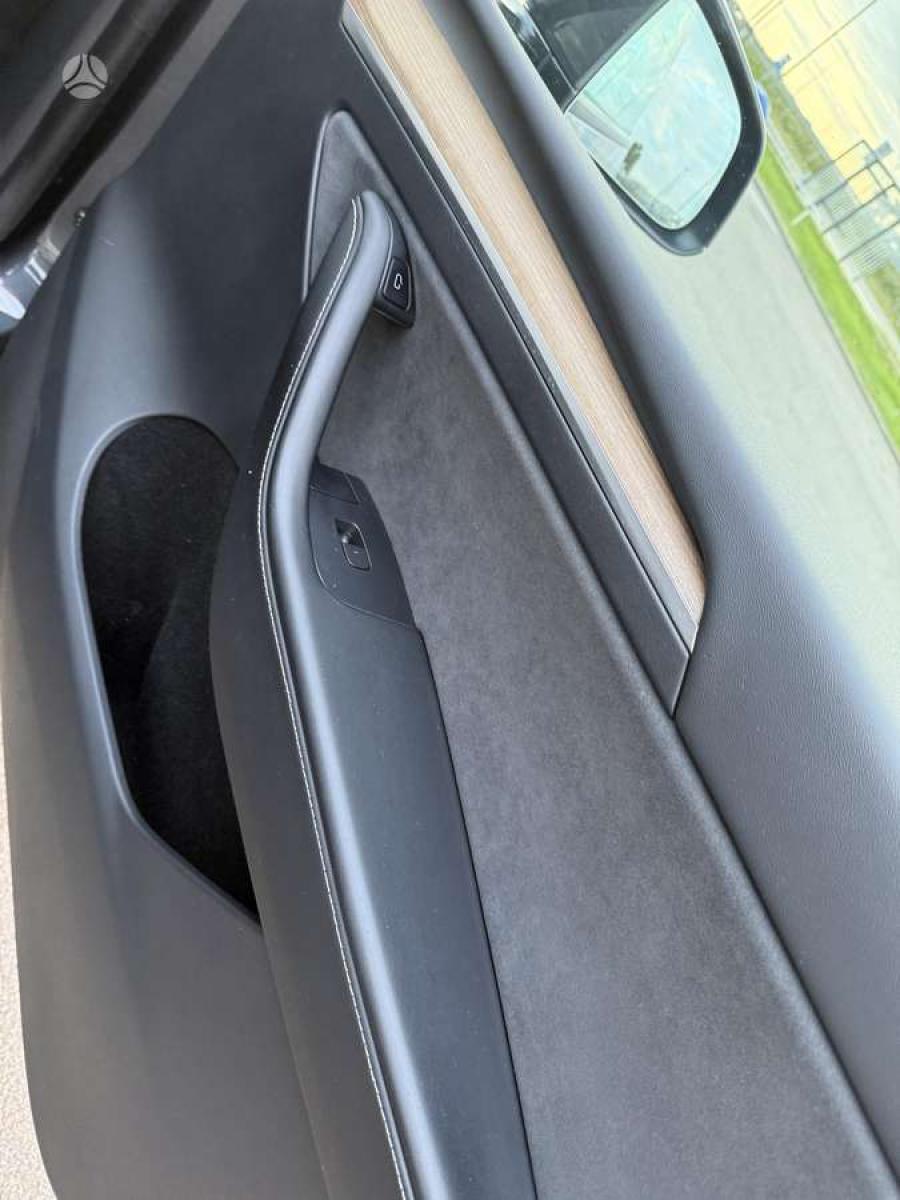 Grey Tesla Model Y 2022 in Marijampole, with an engine capacity of 0.00 L and mileage of 135 thousand km for 27900 €, photo 20 on AUTOMOTO.COM.LV