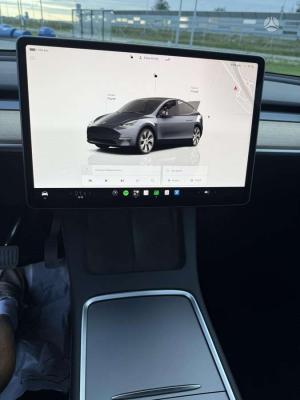 Grey Tesla Model Y 2022 in Marijampole, with an engine capacity of 0.00 L and mileage of 135 thousand km for 27900 €, photo 27 on AUTOMOTO.COM.LV