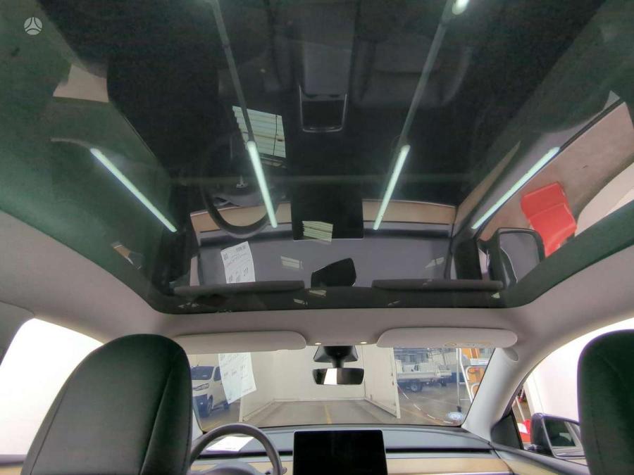 Grey Tesla Model Y 2022 in Vilnius, with an engine capacity of 0.00 L and mileage of 102 thousand km for 33490 €, photo 16 on AUTOMOTO.COM.LV
