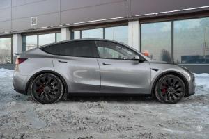 Grey Tesla Model Y 2023 in Vilnius, with an engine capacity of 0.00 L and mileage of 39 thousand km for 37000 €, photo 7 on AUTOMOTO.COM.LV