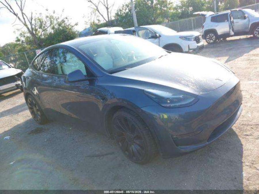Grey Tesla Model Y 2023 in Klaipeda, with an engine capacity of 0.00 L and mileage of 53 thousand km for 12100 €, photo 1 on AUTOMOTO.COM.LV