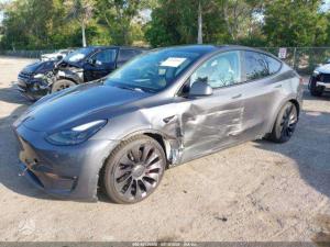 Grey Tesla Model Y 2023 in Klaipeda, with an engine capacity of 0.00 L and mileage of 53 thousand km for 12100 €, photo 3 on AUTOMOTO.COM.LV