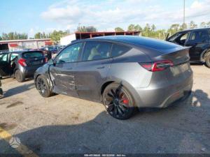 Grey Tesla Model Y 2023 in Klaipeda, with an engine capacity of 0.00 L and mileage of 53 thousand km for 12100 €, photo 4 on AUTOMOTO.COM.LV