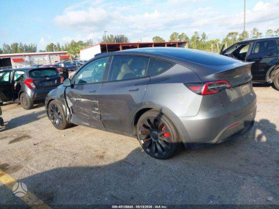 Grey Tesla Model Y 2023 in Klaipeda, with an engine capacity of 0.00 L and mileage of 53 thousand km for 12100 €, photo 4 on AUTOMOTO.COM.LV