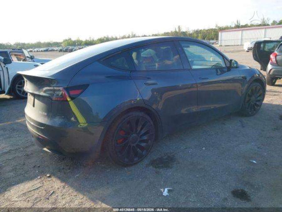 Grey Tesla Model Y 2023 in Klaipeda, with an engine capacity of 0.00 L and mileage of 53 thousand km for 12100 €, photo 5 on AUTOMOTO.COM.LV