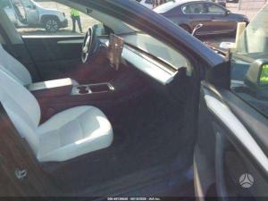 Grey Tesla Model Y 2023 in Klaipeda, with an engine capacity of 0.00 L and mileage of 53 thousand km for 12100 €, photo 6 on AUTOMOTO.COM.LV