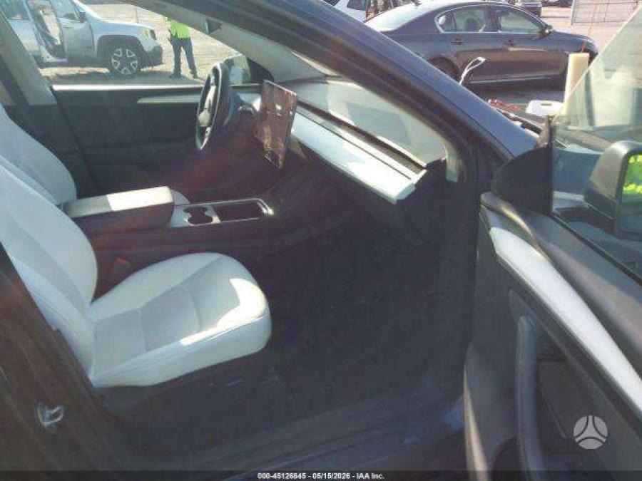 Grey Tesla Model Y 2023 in Klaipeda, with an engine capacity of 0.00 L and mileage of 53 thousand km for 12100 €, photo 6 on AUTOMOTO.COM.LV