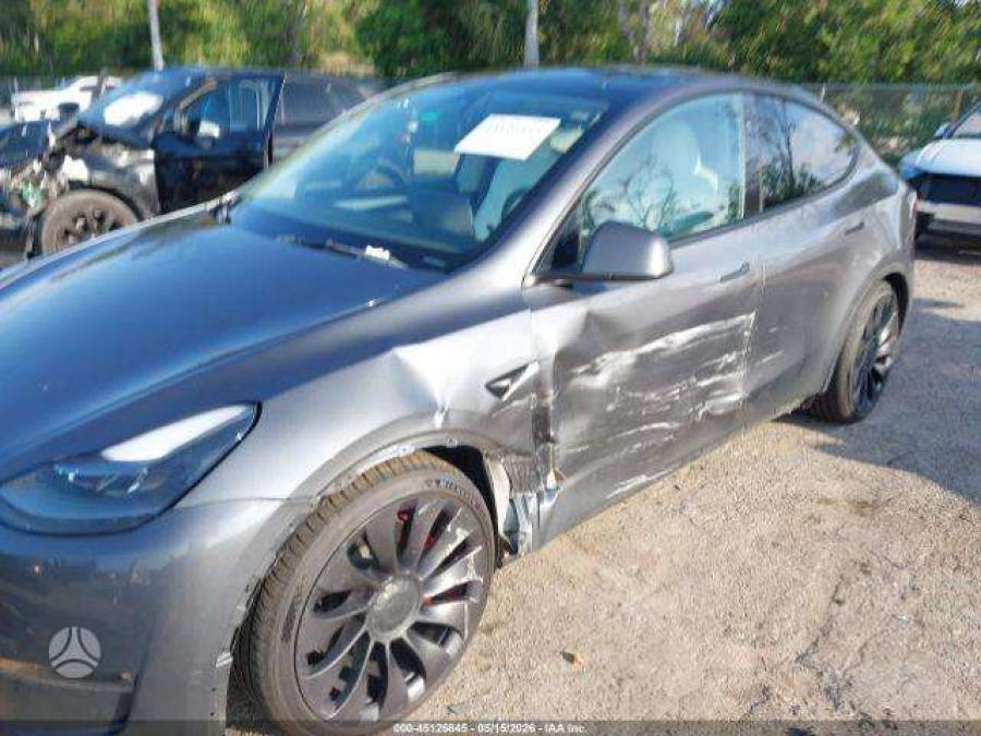 Grey Tesla Model Y 2023 in Klaipeda, with an engine capacity of 0.00 L and mileage of 53 thousand km for 12100 €, photo 7 on AUTOMOTO.COM.LV