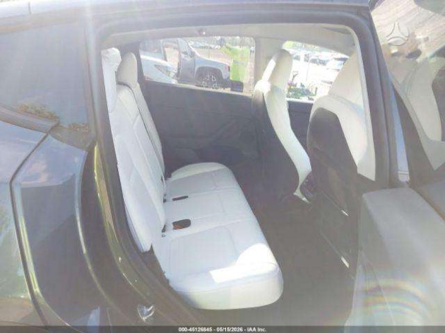Grey Tesla Model Y 2023 in Klaipeda, with an engine capacity of 0.00 L and mileage of 53 thousand km for 12100 €, photo 9 on AUTOMOTO.COM.LV
