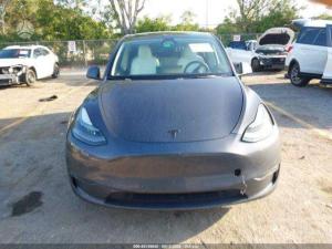 Grey Tesla Model Y 2023 in Klaipeda, with an engine capacity of 0.00 L and mileage of 53 thousand km for 12100 €, photo 13 on AUTOMOTO.COM.LV