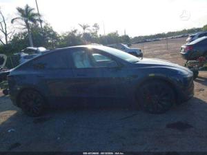 Grey Tesla Model Y 2023 in Klaipeda, with an engine capacity of 0.00 L and mileage of 53 thousand km for 12100 €, photo 14 on AUTOMOTO.COM.LV