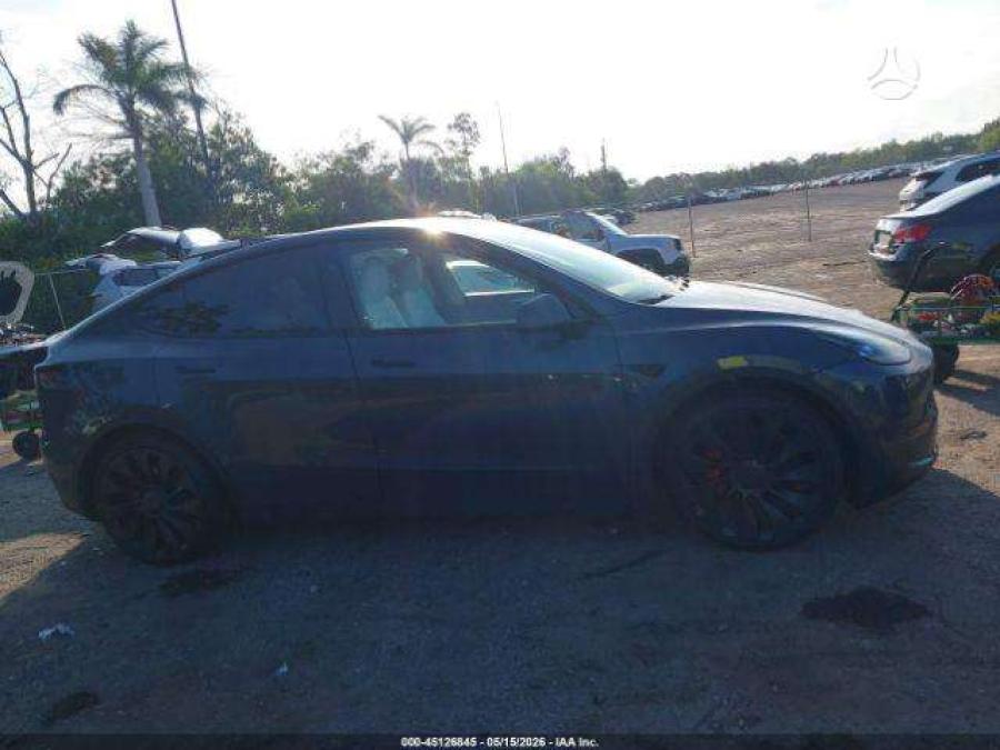 Grey Tesla Model Y 2023 in Klaipeda, with an engine capacity of 0.00 L and mileage of 53 thousand km for 12100 €, photo 14 on AUTOMOTO.COM.LV