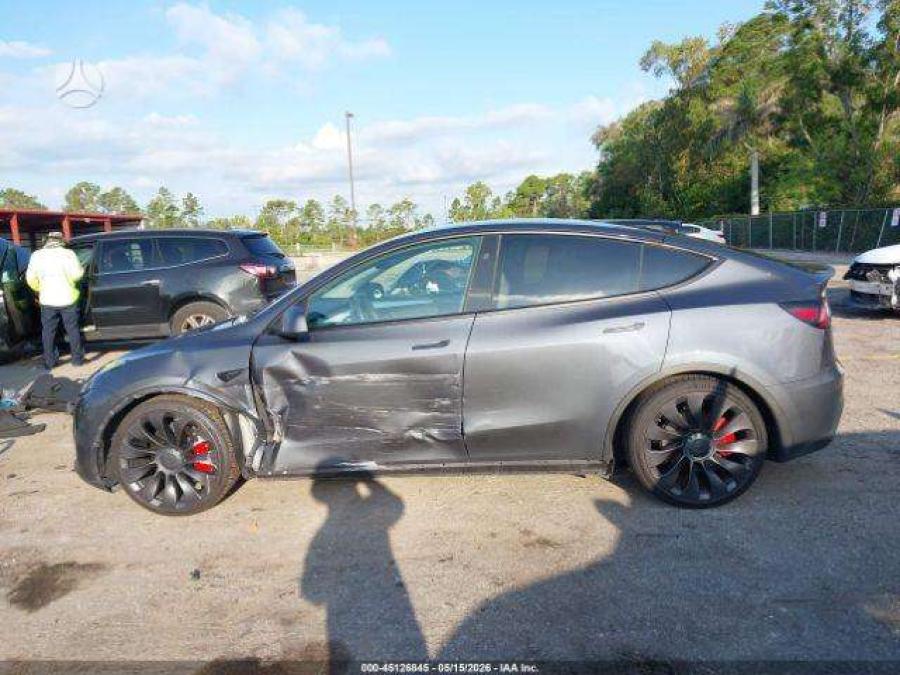 Grey Tesla Model Y 2023 in Klaipeda, with an engine capacity of 0.00 L and mileage of 53 thousand km for 12100 €, photo 15 on AUTOMOTO.COM.LV
